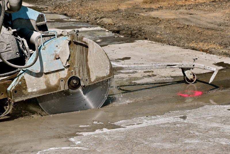 Cutting through Concrete on a Street Project Stock Image - Image of ...