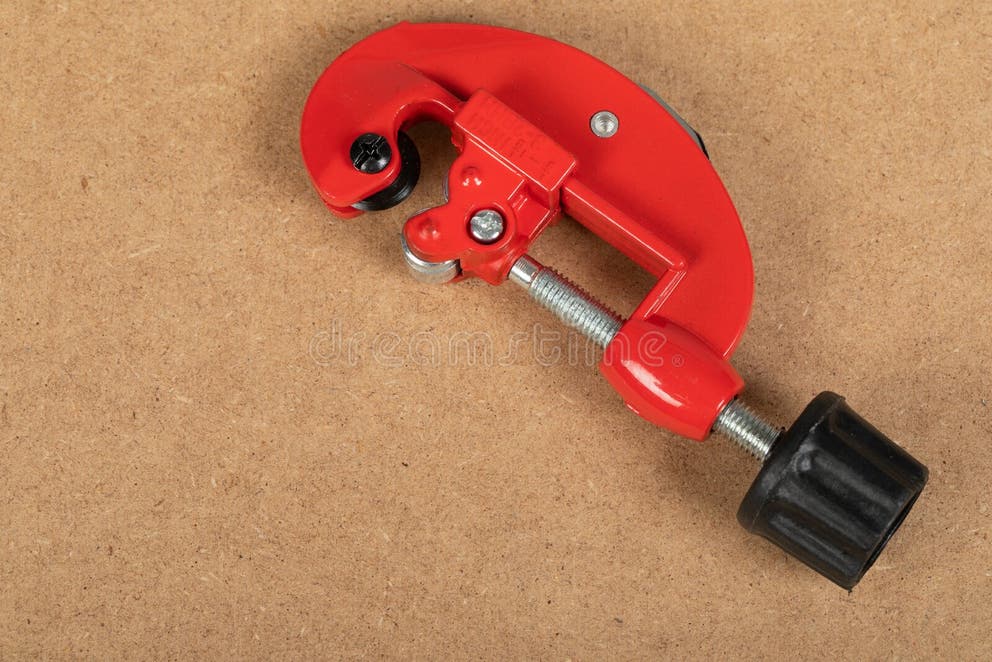 Red pipe cutter stock image. Image of shiny, tube, water - 209067523