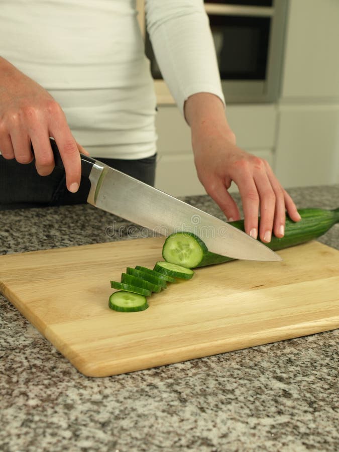 Cutting cucumber stock image. Image of tasty, slices - 26936691