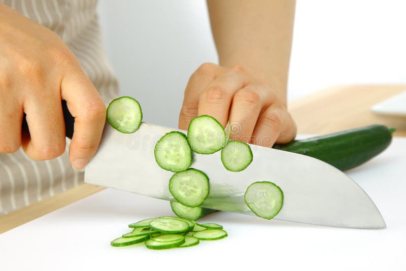 Cutting cucumber stock photo. Image of housework, food - 44301930