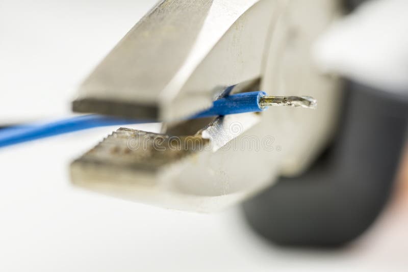 Cutting electrical cable stock photo. Image of cutting - 35520676