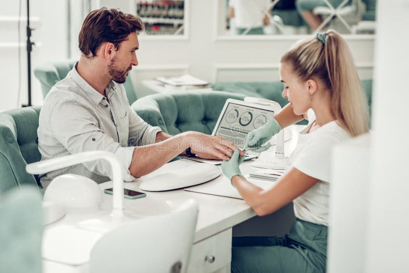 Busy Multifunctional Dark-haired Man Working with Laptop Stock Image ...