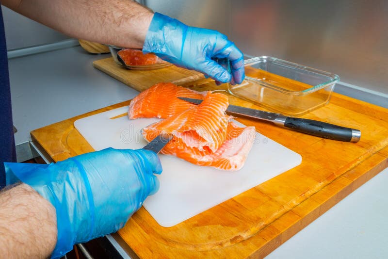 Cutting Fish in the Kitchen. Stock Image - Image of cutting, atlantic ...
