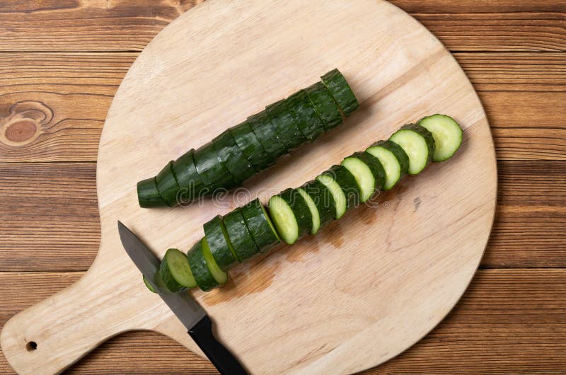 Cutting Fresh Cucumber on Chop Board Stock Image - Image of board ...