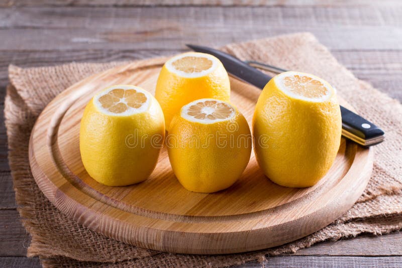 Cutting Fresh Lemon into Pieces Stock Image - Image of cutting, leaf ...