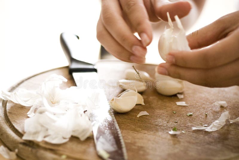 Cutting garlic stock photo. Image of chops, sharp, garlic - 2715932