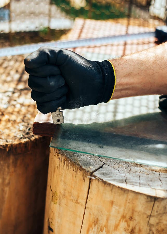 Cutting Glass by Glass Cutter. Man Hands with Gloves Holding Glass ...