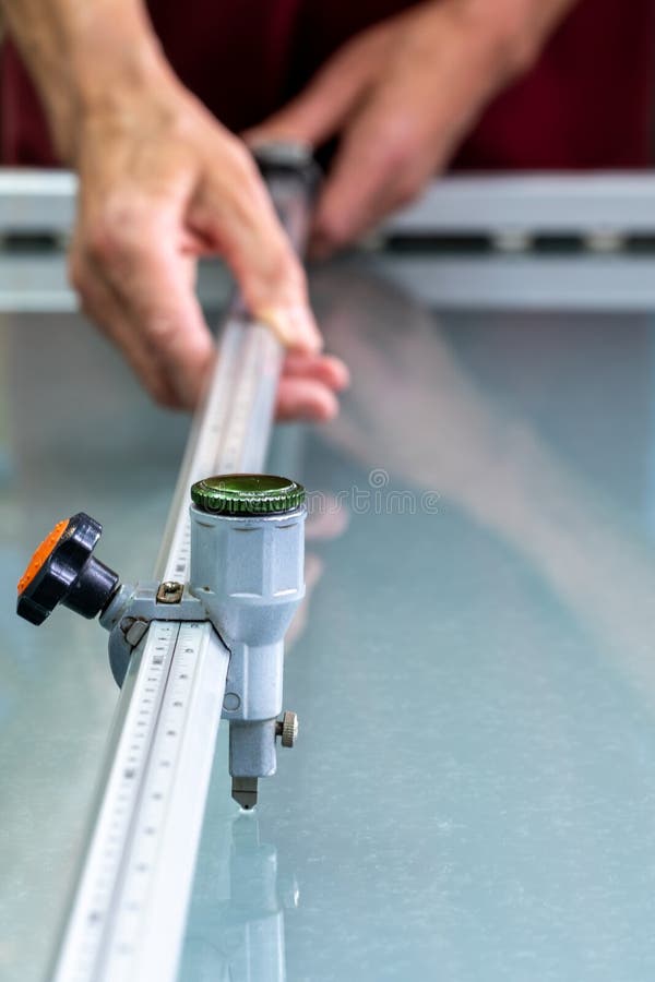 Cutting Glass with a Special Tool. Glass Cutter Stock Image - Image of ...