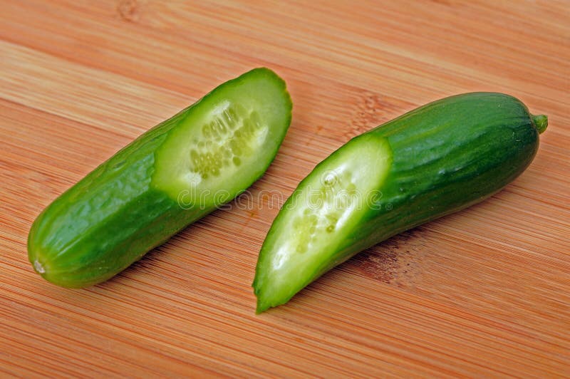 Sliced Cucumber In Half Circle On Cutting Board Stock Photo - Image of ...
