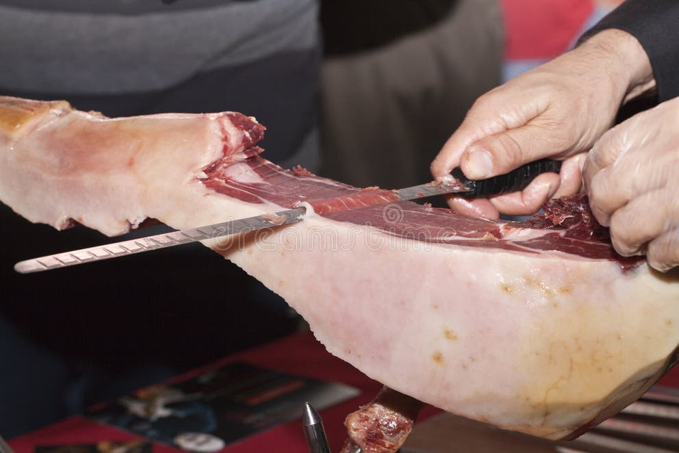 Cutting a ham hands stock image. Image of meat, delicious - 19421045
