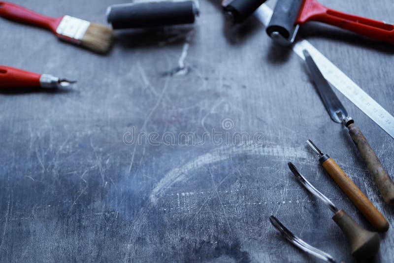 Set of Linocut Tools on a Dark Table with Copy Space Stock Image ...