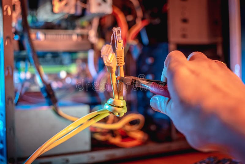 Cutting the Internet Cable Tied into a Knot with Wire Cutters ...