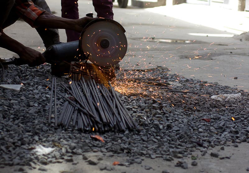 Cutting of iron rods stock image. Image of mass, sparks - 163419725