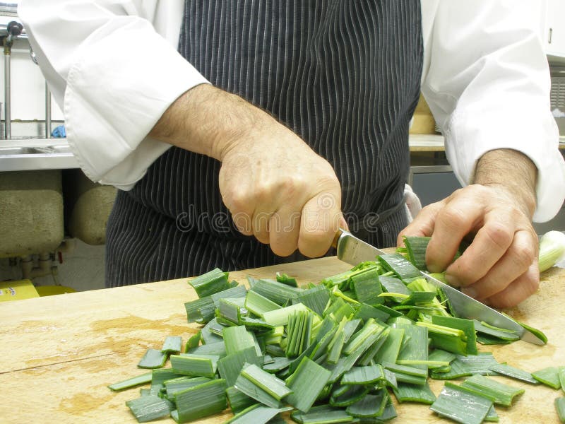 Cutting leeks stock photo. Image of gastronomy, cooking - 3327028