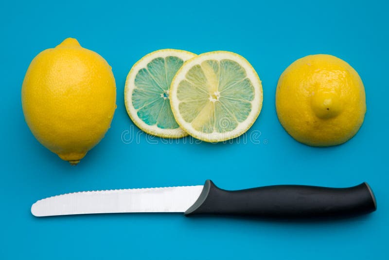 Cutting a lemon stock image. Image of fruit, cutting - 81748645