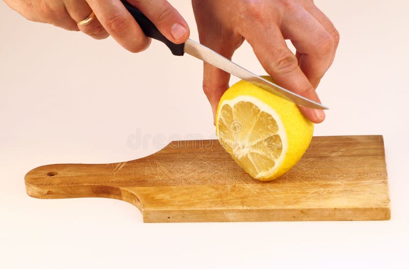 Cutting a lemon stock image. Image of grocery, fresh, citrus - 799301