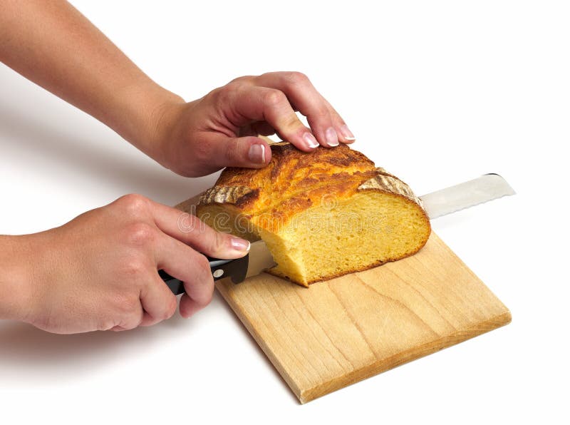 Cutting a loaf of bread stock image. Image of knife, people - 23045595