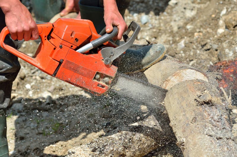 Cutting the log stock image. Image of cutting, lumberjack - 33609439