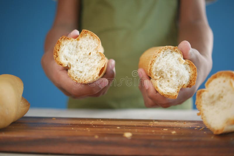 Cutting Long Bread on a Chopping Board Stock Image - Image of ...