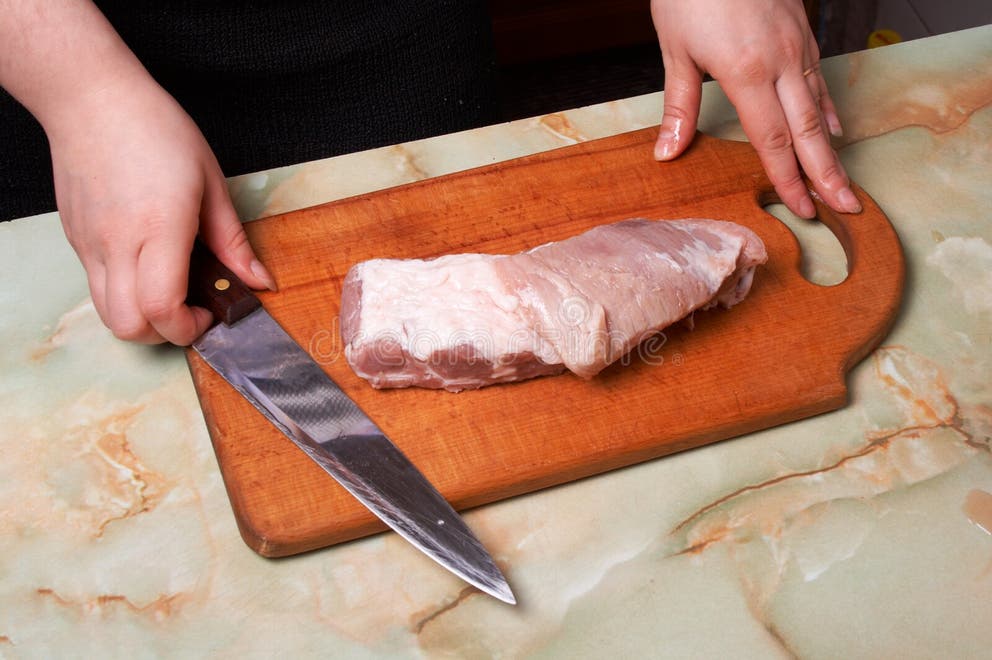 Cutting meat. Begin. stock image. Image of board, freshness - 5075453
