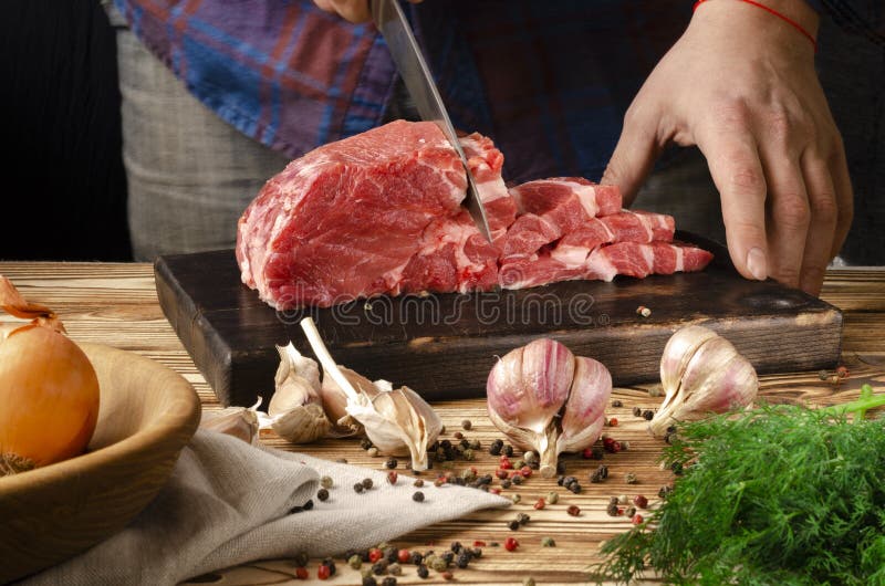 Cutting Meat Steaks for Cooking. Meat Steaks Stock Photo - Image of ...