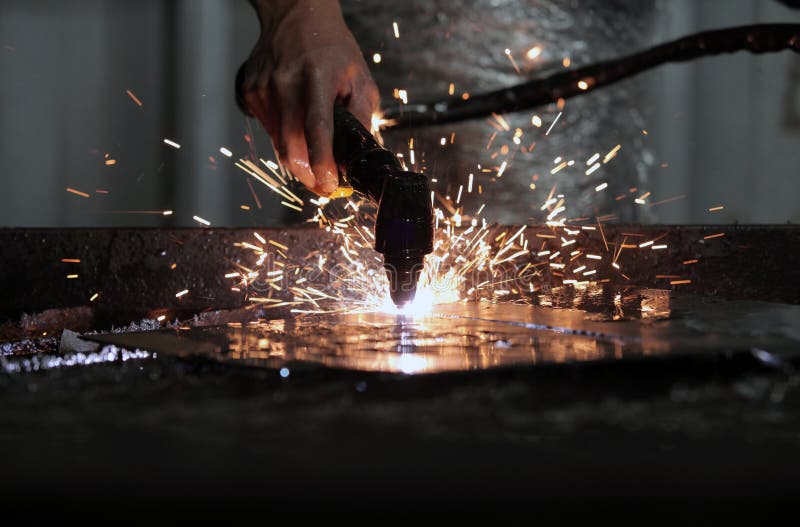 Cutting Metal Plate with a Laser. Stock Photo - Image of font, person ...