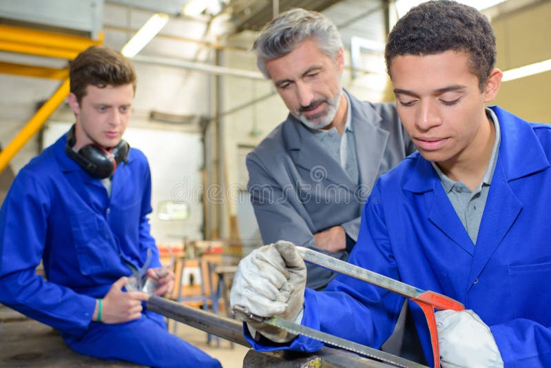Man Work with File Rasp Metal Iron Pipe Gripped in Vice on Workbench ...