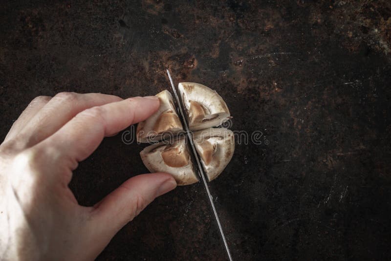Hand cutting a mushroom stock image. Image of wood, hands - 30229949