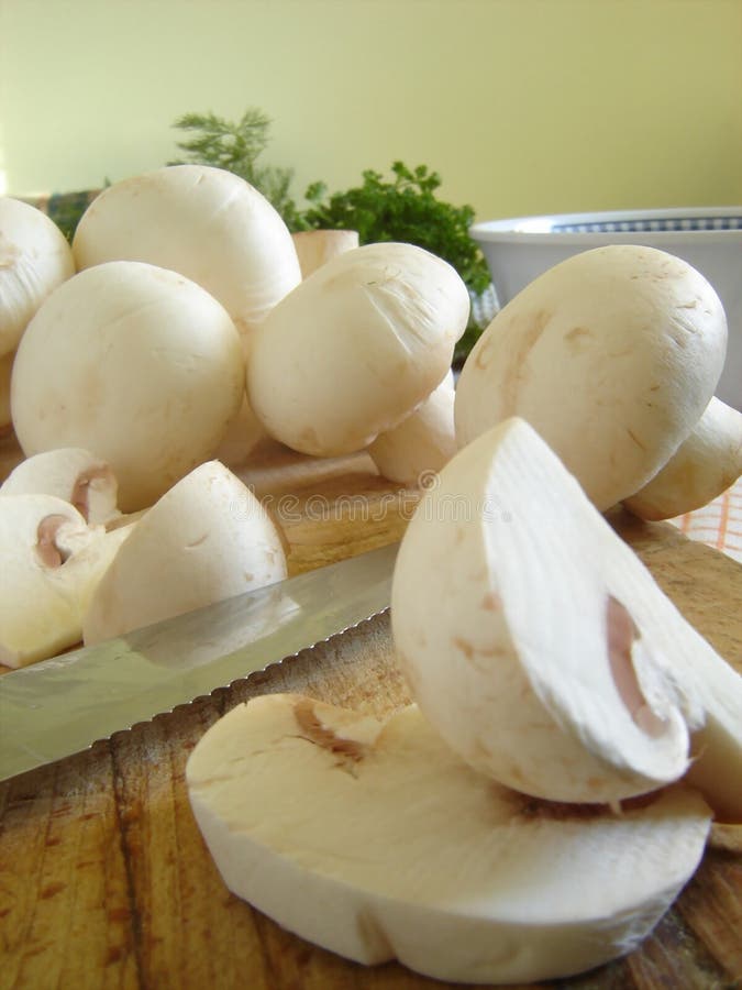 Cutting Mushrooms stock photo. Image of healthy, spring - 1664236