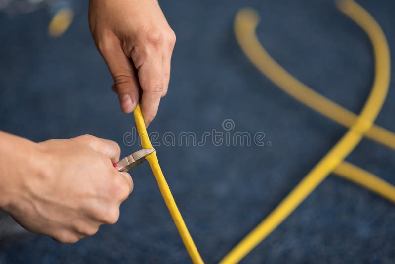 Cutting of the Network Cable with Cutters, Process of Laying the Local ...