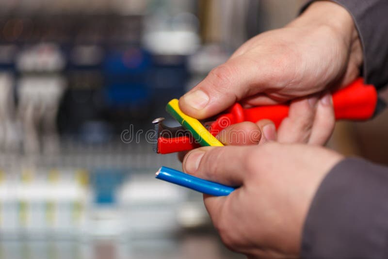 Cutting Off the Ground Wire Stock Photo - Image of insulated, knife ...