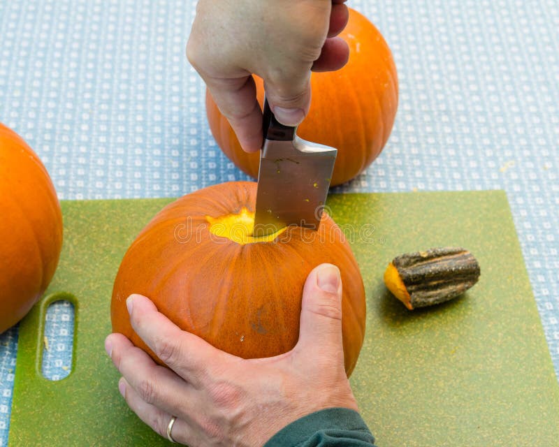 Cutting Open a Pumpkin in the Kitchen Stock Image - Image of cooking ...