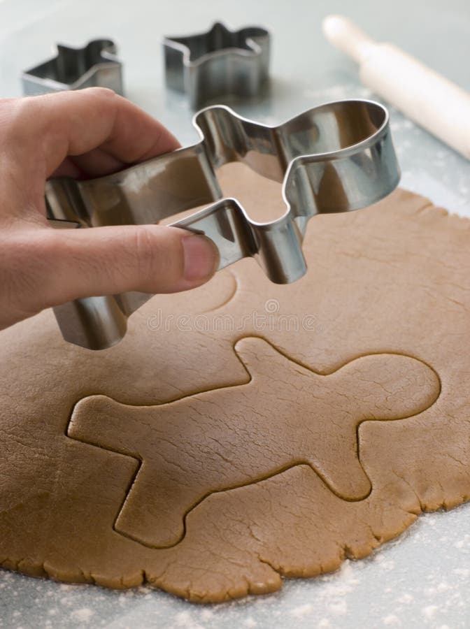 Cutting Out a Gingerbread Man Stock Image - Image of cutter, people ...