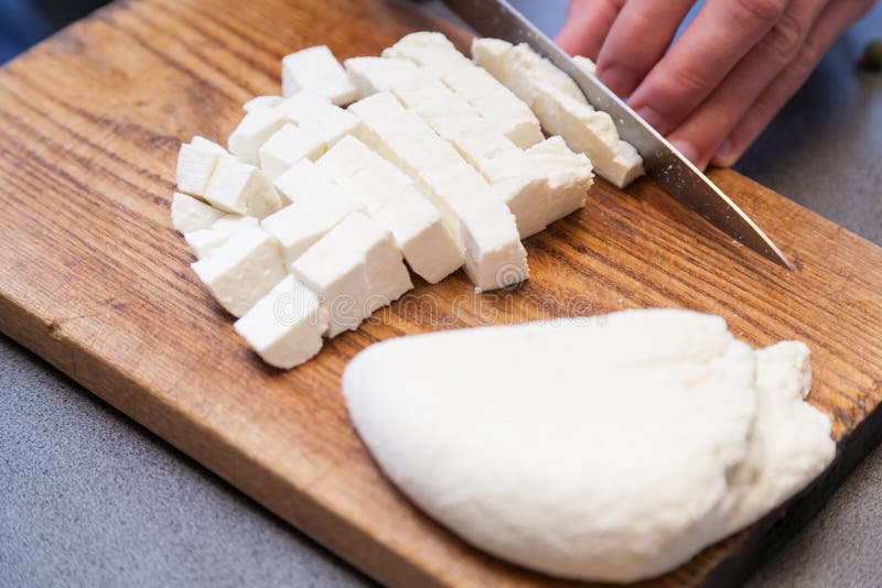 Cutting paneer stock image. Image of cube, piece, product - 49583115