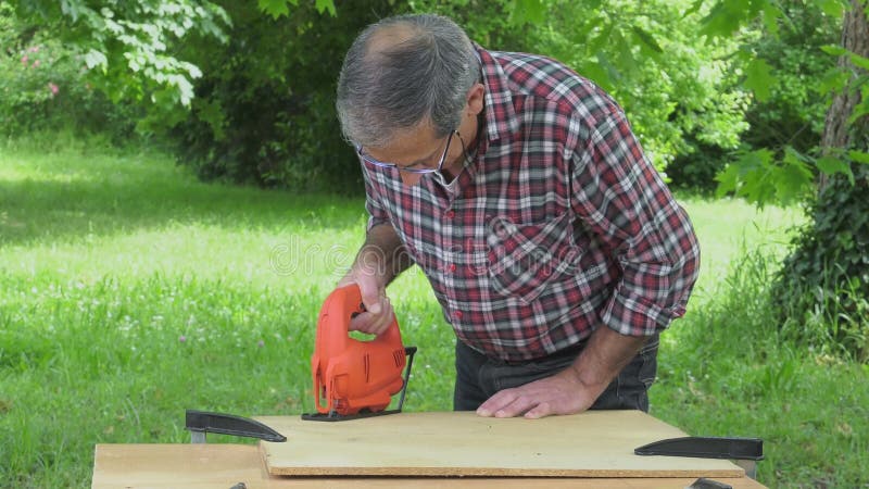 Cutting a Panel with a Jigsaw Stock Footage - Video of drill, measuring ...