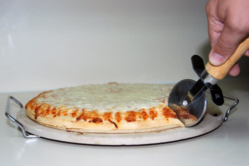 Cutting Pizza Picture. Image: 2704396