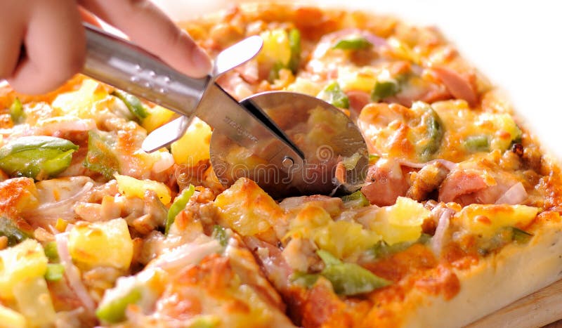 Cutting pizza stock image. Image of knife, topping, bake - 9631217