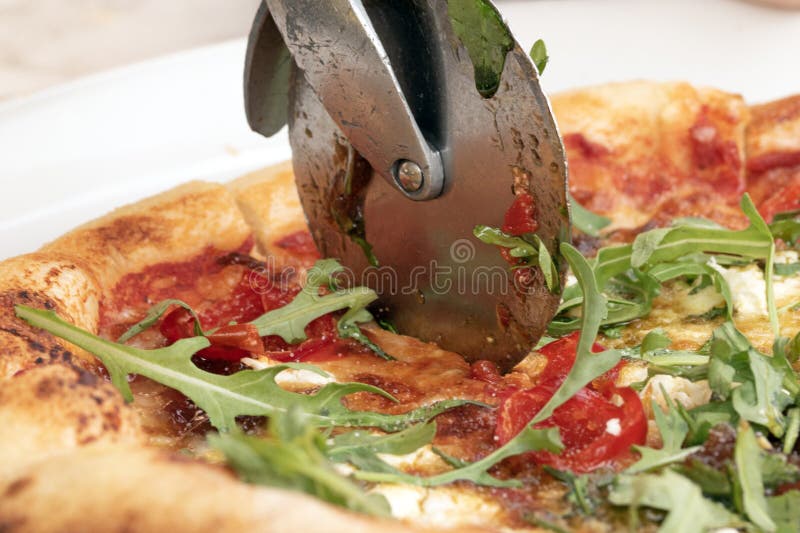 Cutting Pizza with a Wheel Cutter Stock Image - Image of meal, round ...