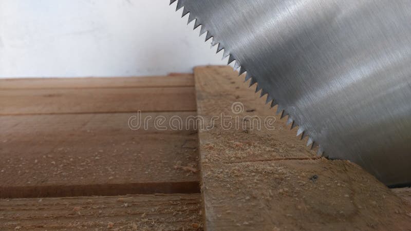 Cutting Plank with Hand Saw Stock Photo - Image of workshop, tools ...