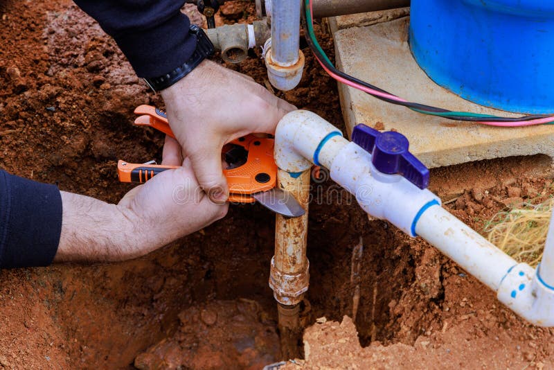 Cutting Plastic PVC Pipe with Special Pair of Scissors by a Plumber ...