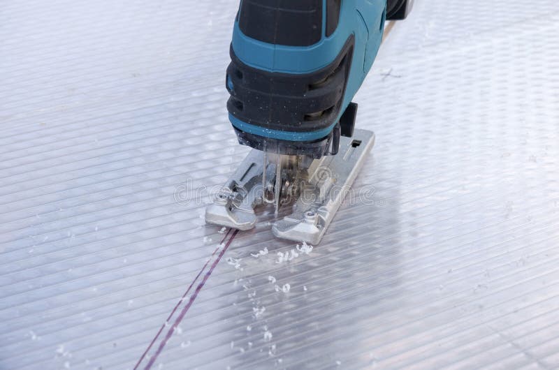 Cutting Polycarbonate Sheet by Cutting Machine Jigsaw Stock Image ...