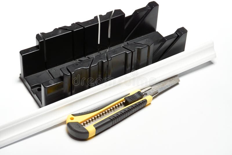 Cutting a Polystyrene Baseboard with a Clerical Knife Using a Corner ...