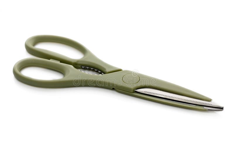 Cutting with Precision Using Green Scissors on a Crafting Table in ...