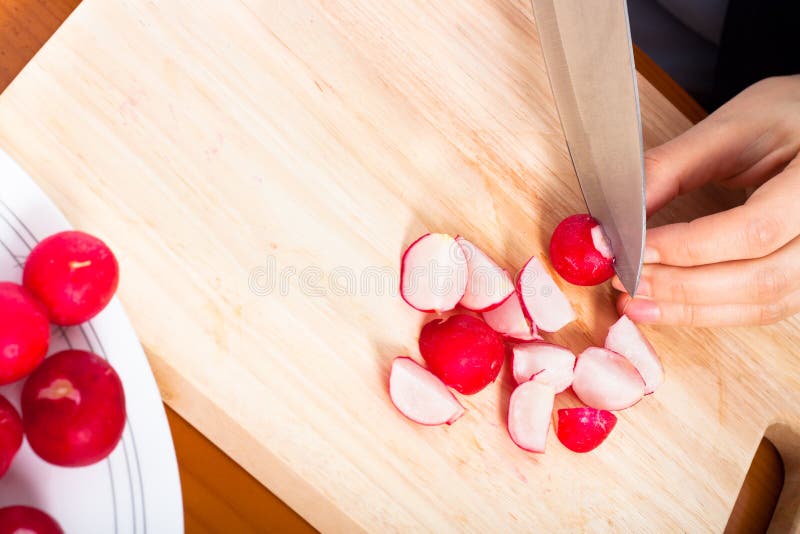 Cutting radishes stock photo. Image of radish, diet, ingredients - 23962172