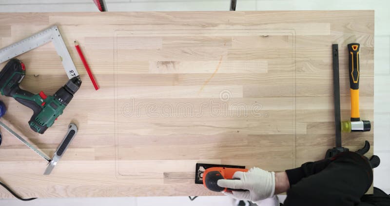 Cutting a Rectangular Shape from Wooden Board with Electric Saw Stock ...