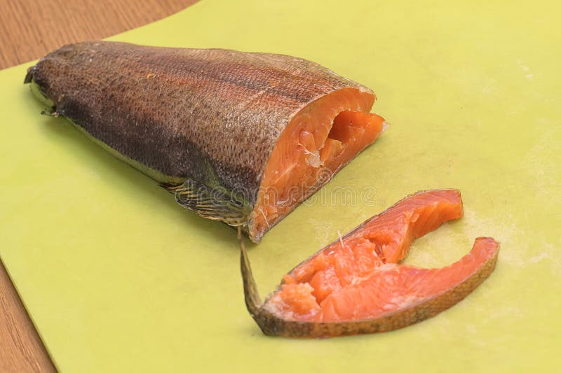 Cutting red fish Close-up stock photo. Image of slice - 103515464