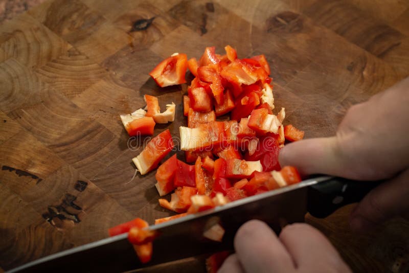 Cutting Red Pepper on the Table Stock Image - Image of indoors, human ...