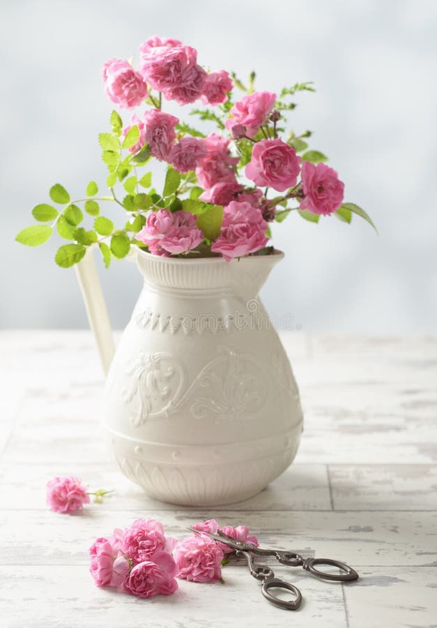Cutting Roses stock photo. Image of wooden, bouquet, vase - 42270038