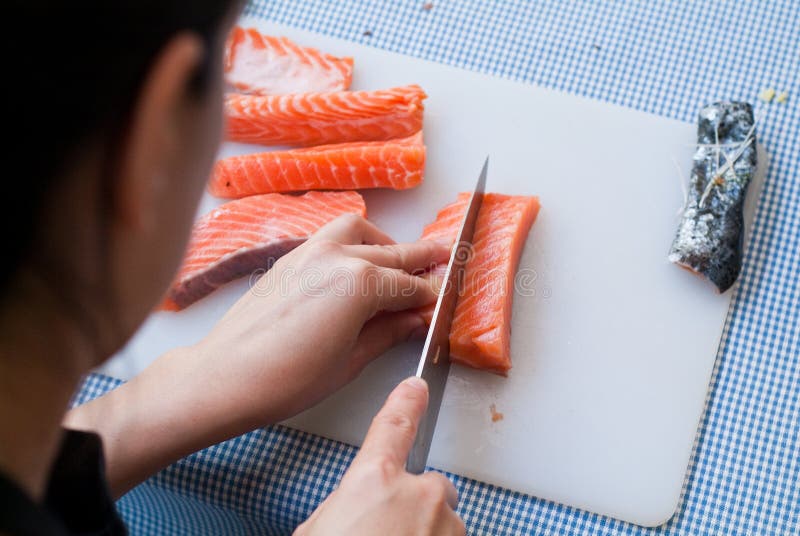 Cutting salmon stock image. Image of salmon, fish, hands - 21673899