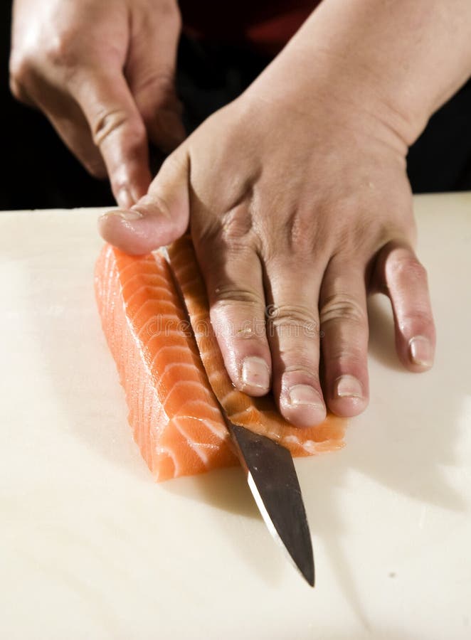 Cutting Salmon stock photo. Image of eating, knife, delicious - 33224174